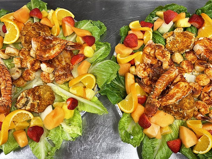 The Caribbean Seafood Combo arrives like edible modern art. Lobster, shrimp, and crab nestled among fresh fruit&mdash;Neptune himself would approve.