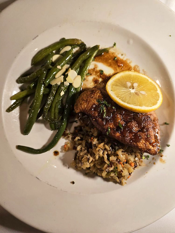 Duck that didn't fly south for the winter, instead landing gracefully atop wild rice with green beans that actually taste like vegetables should.