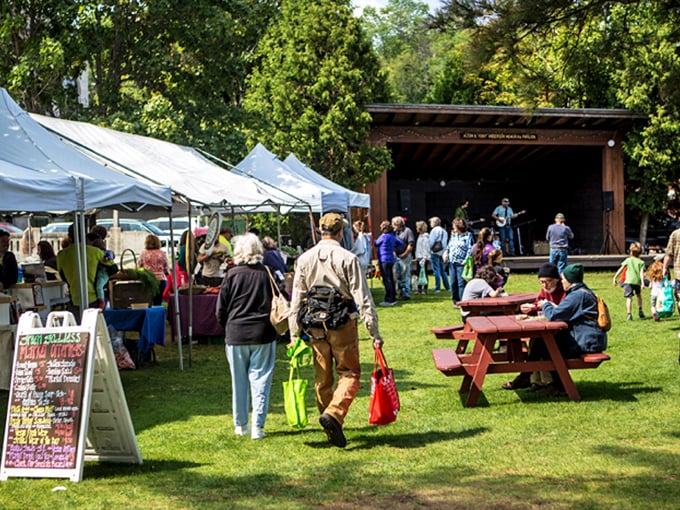 At the local farmers market, the distance between farm and table is measured in footsteps and conversations, not miles.