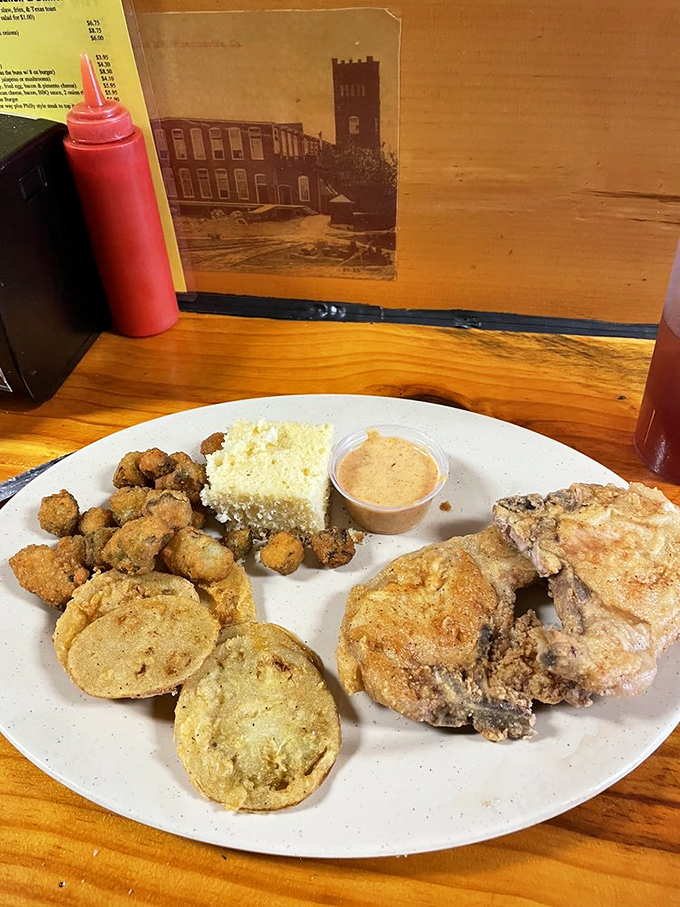 Southern lunch plates don't mess around&mdash;crispy fried pork chops with all the fixings that remind you grandma didn't raise no fool.
