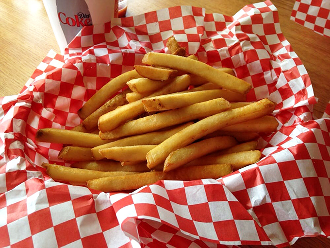 Golden fries in checkered paper &ndash; simple perfection. The supporting actor that sometimes steals the show from the headliner dogs and burgers.