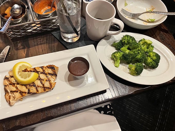 Simplicity done right: grilled salmon with lemon and broccoli, for when you want to pretend you're being virtuous.