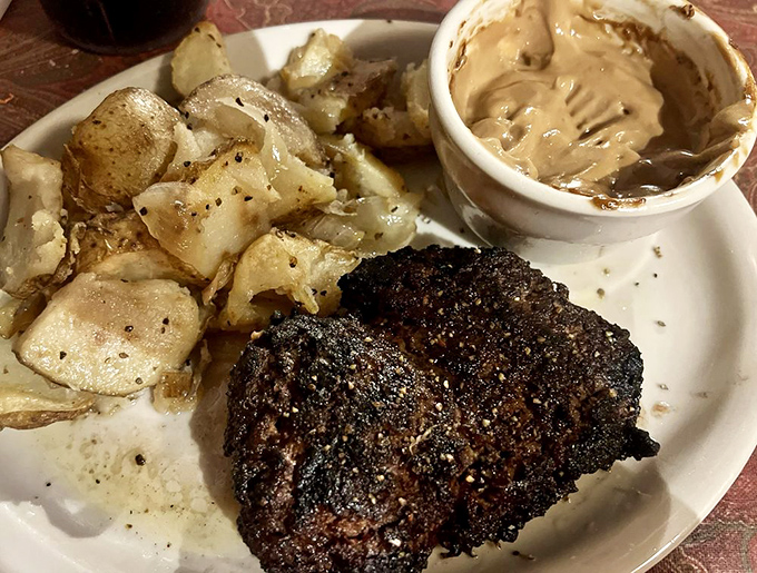 When your hamburger steak arrives with a blackened crust that would make New Orleans chefs nod in approval, you know you're in good hands.