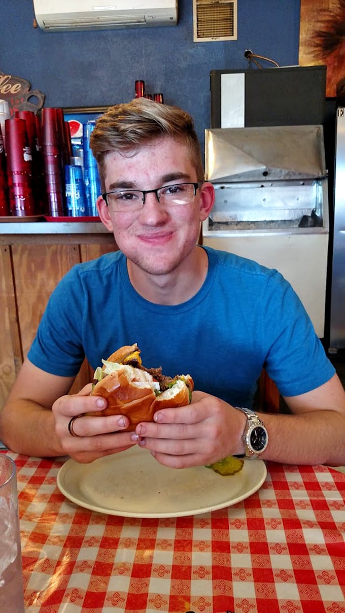 The classic red-checkered tablecloths set the stage for burger bliss that transforms ordinary lunch breaks into memorable occasions.