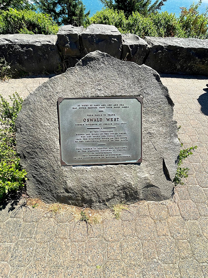 A memorial stone honors Oswald West, whose foresight preserved this coastal treasure for generations of beach lovers. 