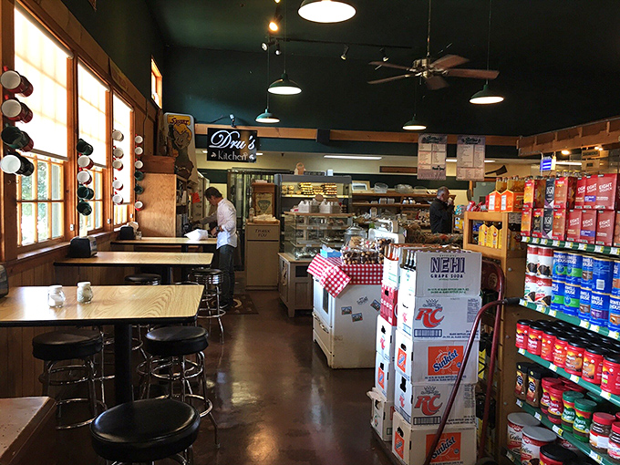 The dining area feels like eating in someone's lovingly maintained cabin, where overhead fans circulate the aromas of deli dreams coming true.