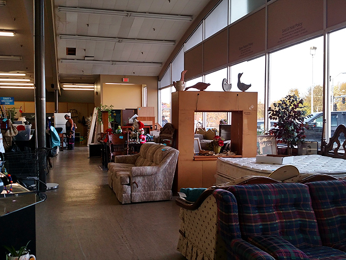 The store's mission statement stands proudly above racks of carefully curated clothing, reminding shoppers their dollars do double duty. 