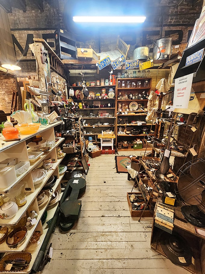 Vintage advertising signs create a colorful tapestry of American consumerism—when Supreme Auto Oil promised less carbon and more adventure.