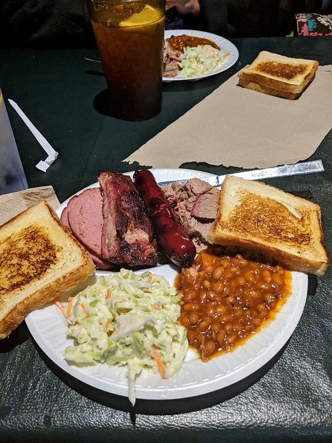 This isn't just a meal; it's a barbecue portfolio diversification strategy with multiple protein options and strategic carb placement.
