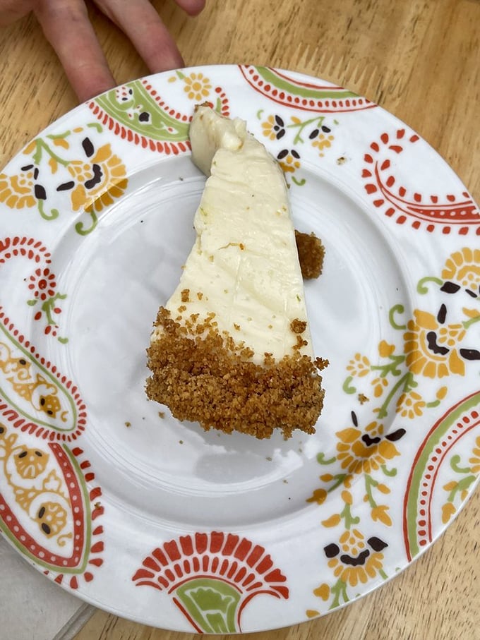 This slice of lime cake isn't just dessert; it's what happiness would look like if it decided to become a baked good.