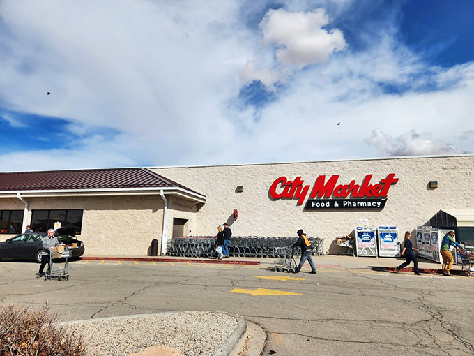 City Market: Where climbers, river guides, and retirees converge to debate the merits of trail mix ingredients and sunscreen SPF ratings.