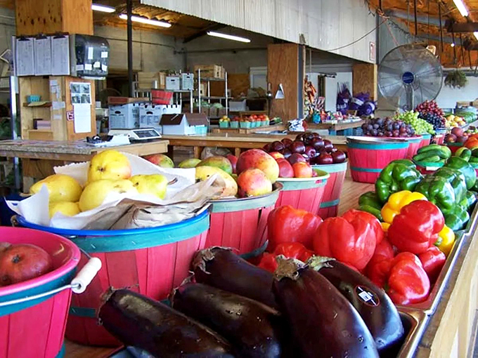 A rainbow harvest displayed in vibrant baskets&mdash;proof that Georgia produce doesn't need fancy packaging to make your mouth water.