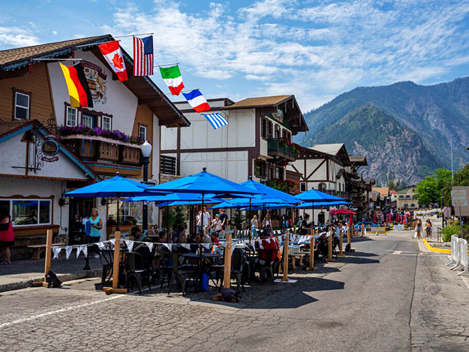 Al fresco dining beneath international flags&mdash;where Washington wine meets German cuisine and nobody mentions the irony of wearing lederhosen in summer heat.