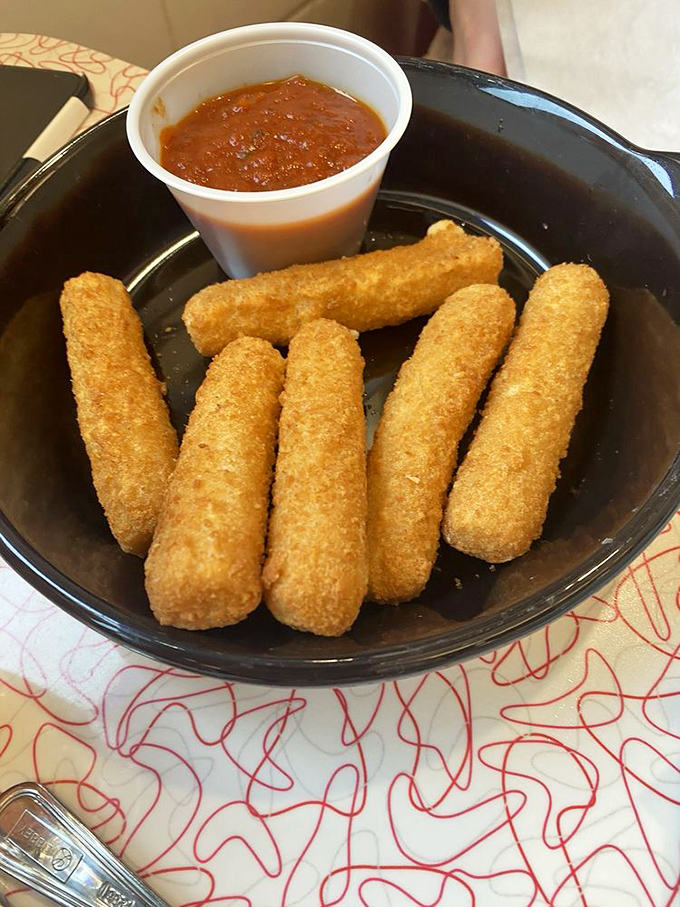 Mozzarella sticks: the adult version of string cheese that required someone to brilliantly think, "What if we breaded this, fried it, and added marinara?"
