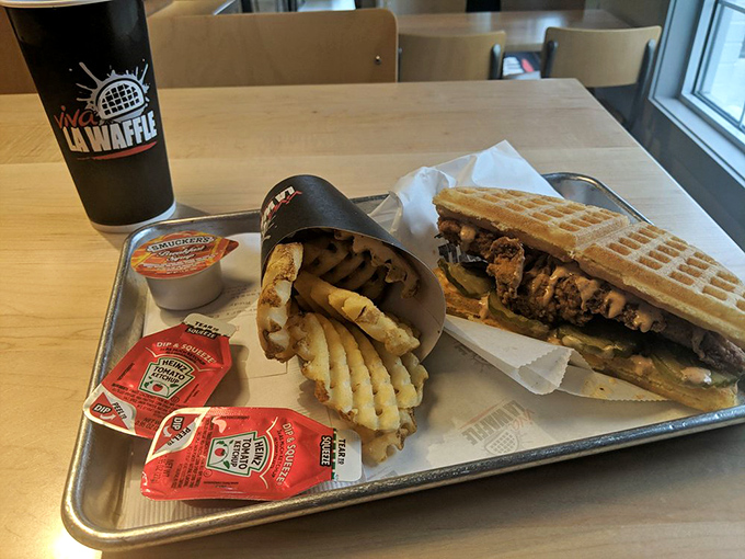 The complete experience: sandwich, fries, and that signature cup. A meal that understands the importance of presentation.