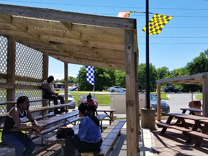 The spectator zone: where checkered flags wave and families cheer on their speed demons with the enthusiasm of Indy 500 fans.