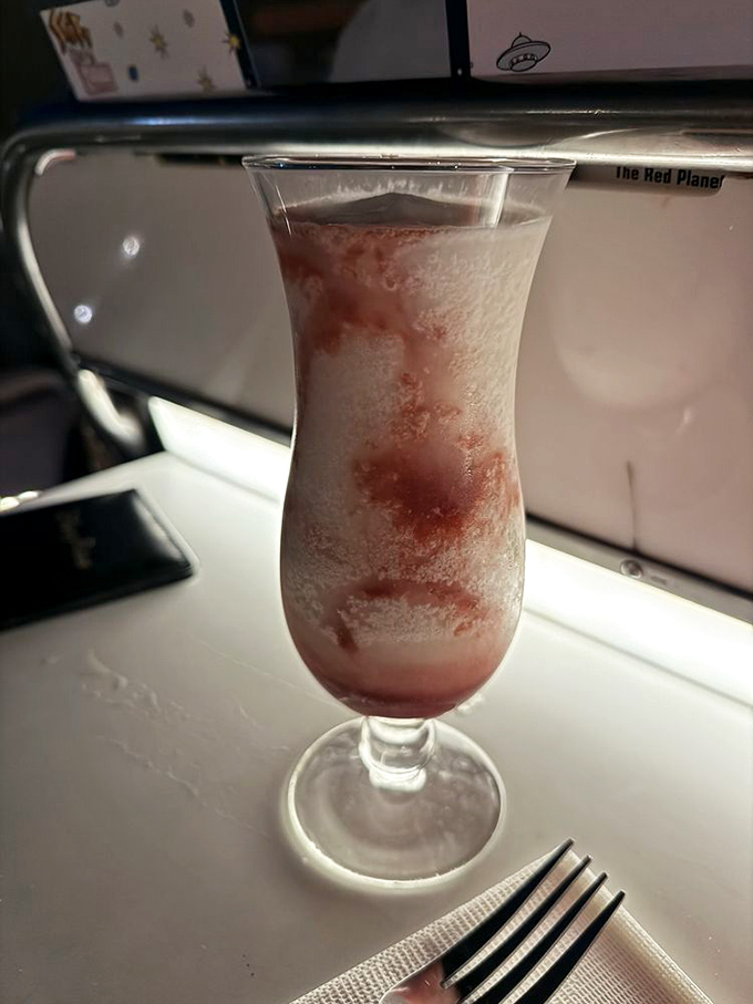 This tropical concoction looks like something The Jetsons would sip poolside, retrofuturism in a glass.