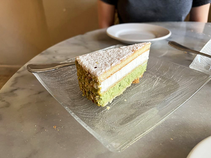 This isn't just dessert&mdash;it's edible geometry. Layers of pistachio, cream, and cake that deserve their own museum exhibit.