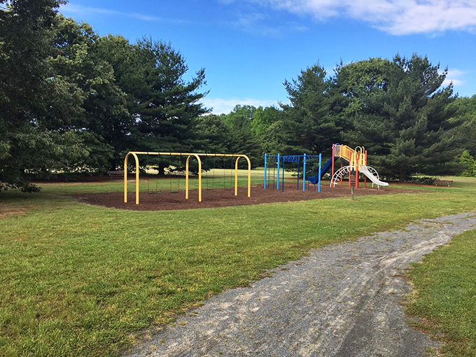 Primary colors and simple pleasures—this playground reminds us that entertainment existed long before smartphones demanded our thumbs.