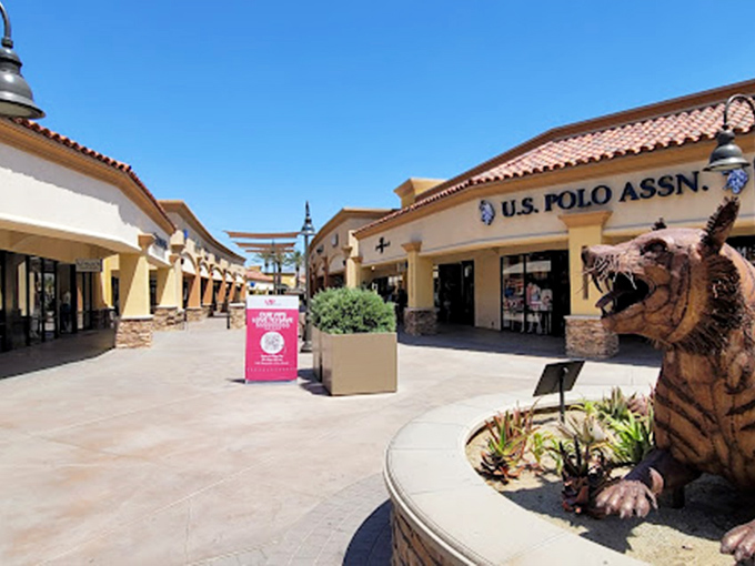 The U.S. Polo Assn. storefront, complete with tiger sculpture, bringing unexpected whimsy to an otherwise sophisticated shopping experience.