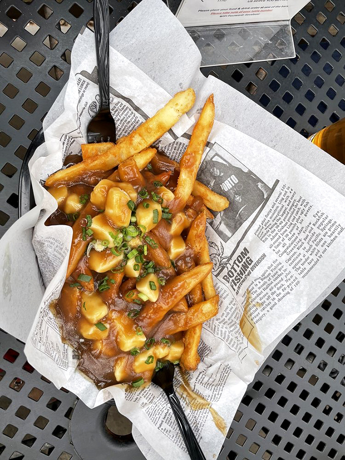 Poutine that would make Canadians weep with joy&mdash;golden fries swimming in gravy with cheese curds playing the role of delicious life preservers.