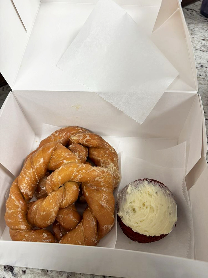 A twisted glazed pretzel and frosted red velvet sitting in perfect harmony&mdash;the pastry equivalent of a buddy-cop movie we'd all watch.