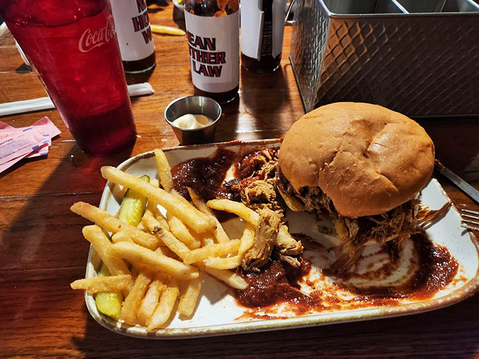 The pulled pork sandwich &ndash; where smoke-kissed meat meets pillowy bun, creating a handheld masterpiece that requires extra napkins and zero shame.