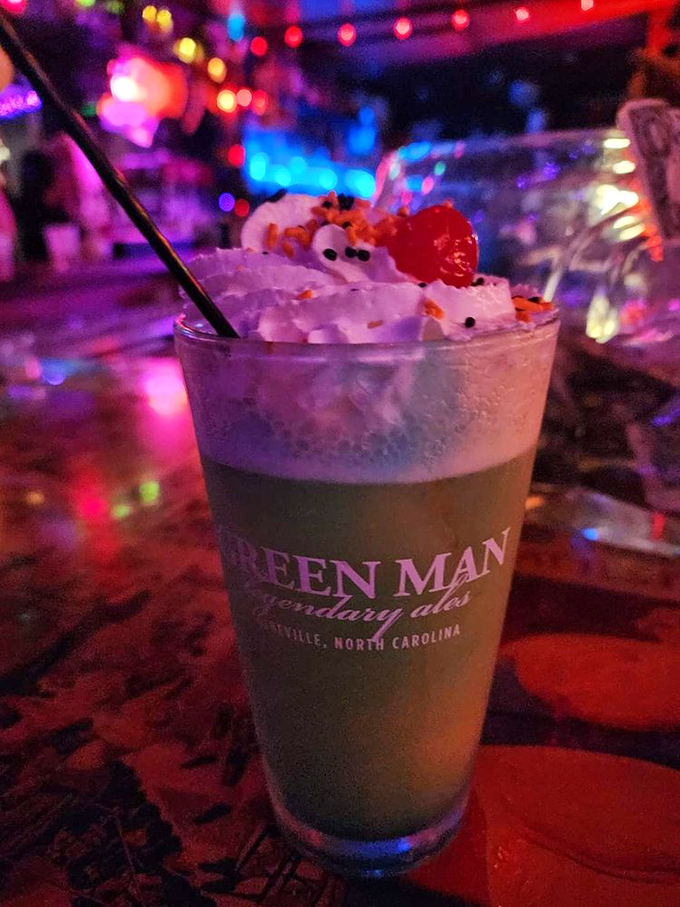 This isn't just a cocktail, it's a mood-altering experience featuring whipped cream and what appears to be every color in the rainbow.