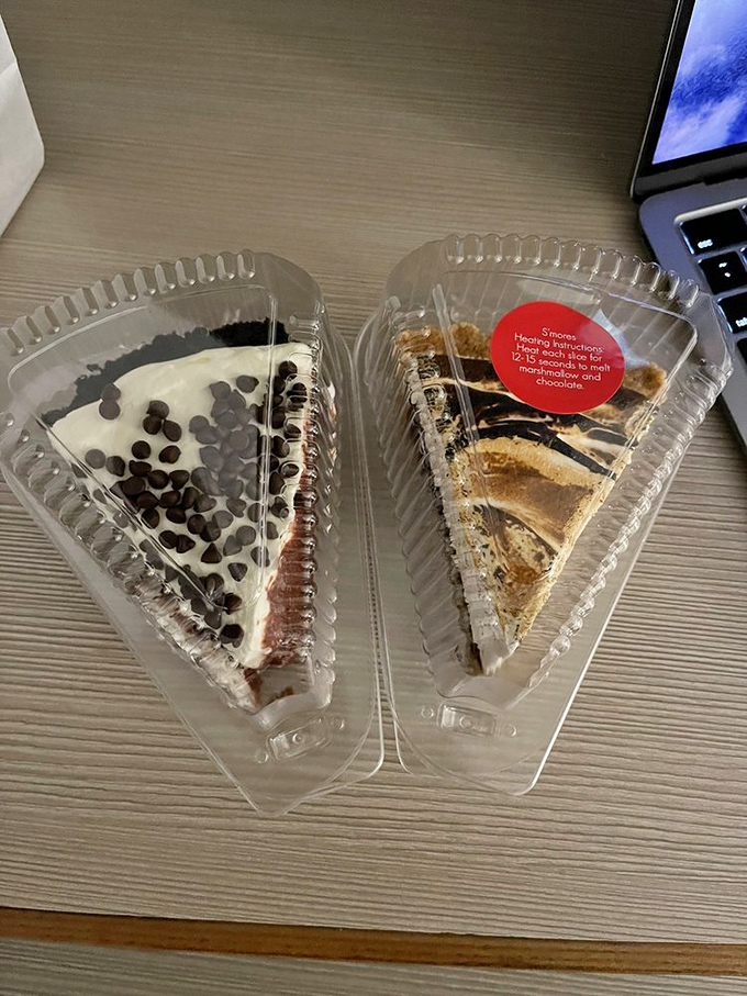 Two slices that prove pie is the ultimate desk lunch. That S'mores slice has marshmallow that would make a campfire jealous.