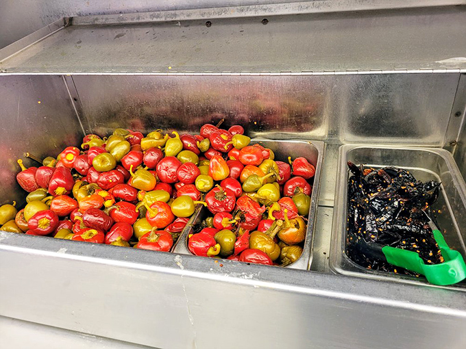 A colorful tray of peppers waiting for their moment of glory. These little flavor bombs transform an ordinary cheesesteak into something extraordinary.