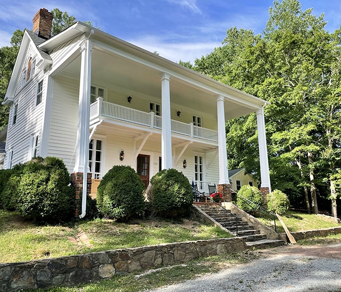 White columns, wraparound porches, and grand staircases—this historic home isn't just architecture, it's a time machine disguised as a building.