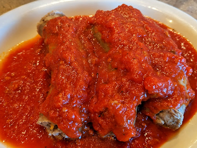 Sausage bathing in sauce like it's at a five-star spa. These aren't just links—they're a testament to the power of patience and proper seasoning.