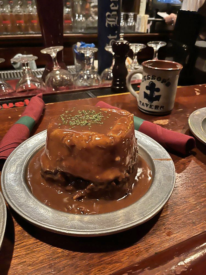 Shepherd's pie that doesn't just sit on the plate—it stands at attention, a monument to gravy-soaked comfort that colonists would have written home about.