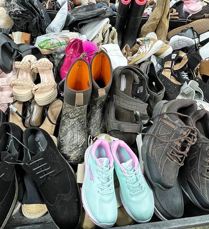 If Cinderella shopped discount bins, she'd find her perfect fit here among the jumble of footwear waiting for their glass slipper moment.