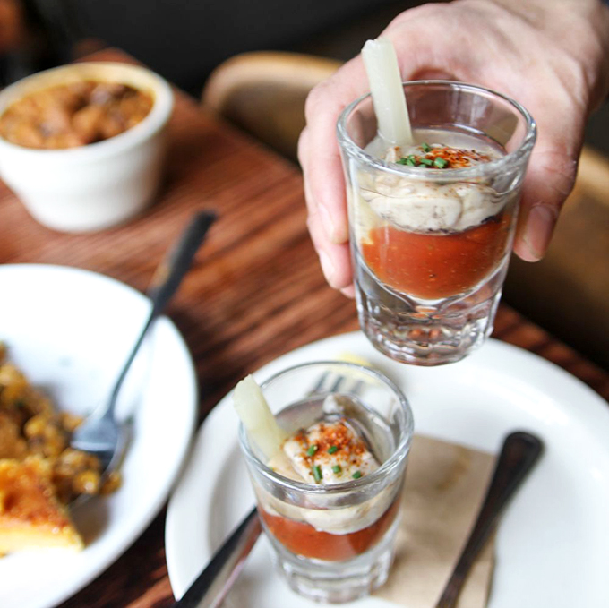 Smoked oyster shooters that deliver the ocean and smokehouse in one perfect gulp&mdash;a tiny flavor explosion in glassware