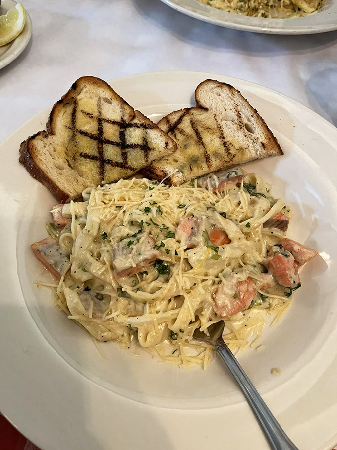Pasta that doesn't just have seafood in it but seems spiritually committed to the ocean, with cream sauce binding salmon and noodles in delicious matrimony.