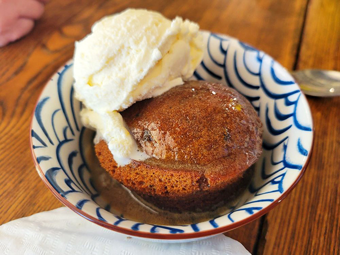 Sticky Toffee Pudding that's worth every calorie, swimming in a sauce so good you'll consider drinking it directly from the bowl.