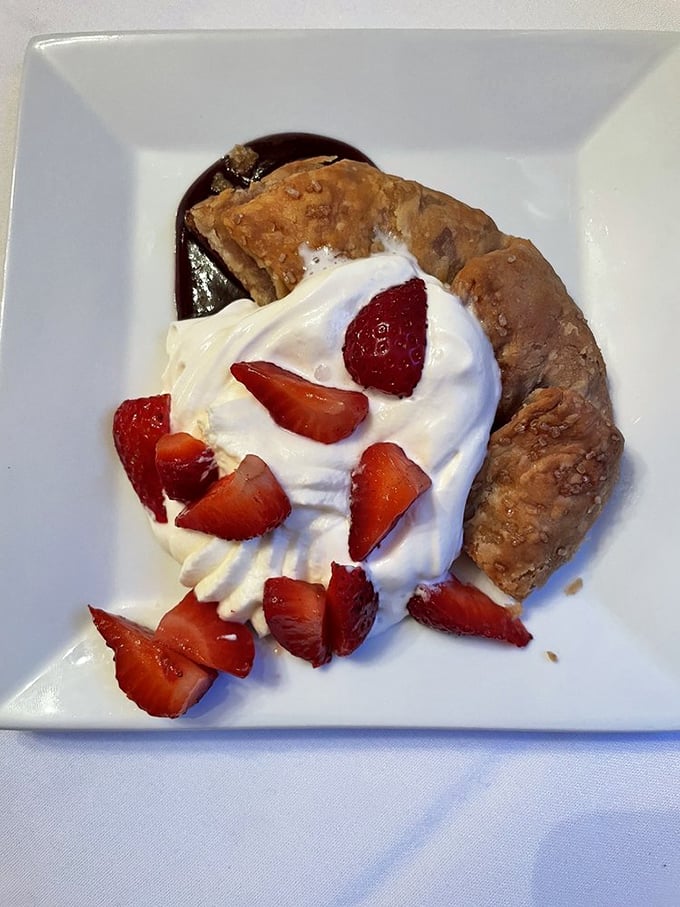 A pastry so flaky it could be described as "emotionally unavailable." Fresh strawberries and whipped cream make this dessert worth the commitment.
