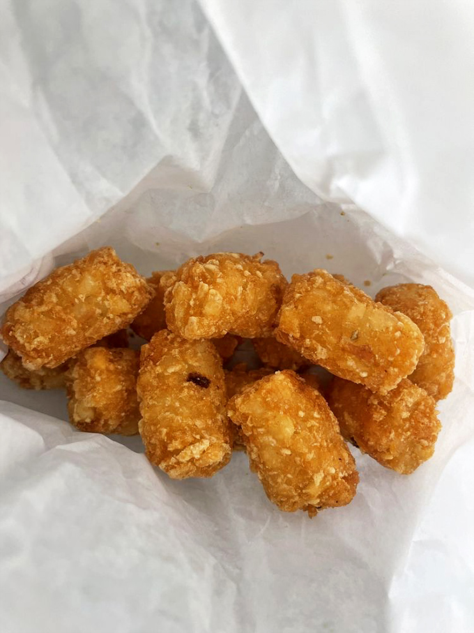 These aren't just tater tots&mdash;they're little golden nuggets of potato perfection. Crispy exterior, fluffy interior, and absolutely impossible to stop eating.