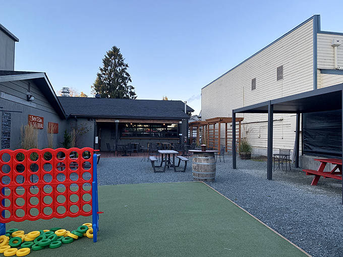 The Firehall Kitchen & Taphouse's outdoor patio has mastered the art of casual perfection, where picnic tables become culinary thrones.