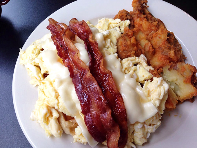 Perfectly cooked eggs, crispy bacon, and fluffy scrambled eggs&mdash;breakfast's greatest hits album, served on a plate that demands an encore.