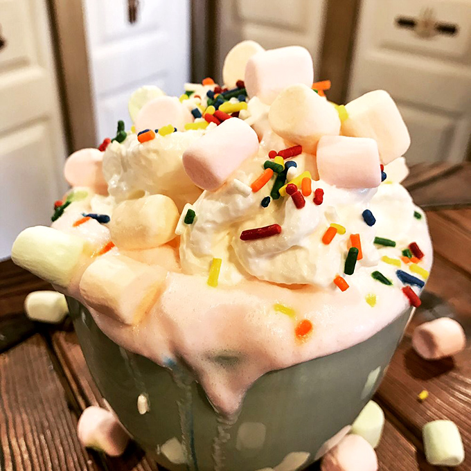 This isn't just hot chocolate, it's childhood wonder in liquid form&mdash;topped with a cloud of whipped cream, marshmallows, and sprinkles for the young at heart.