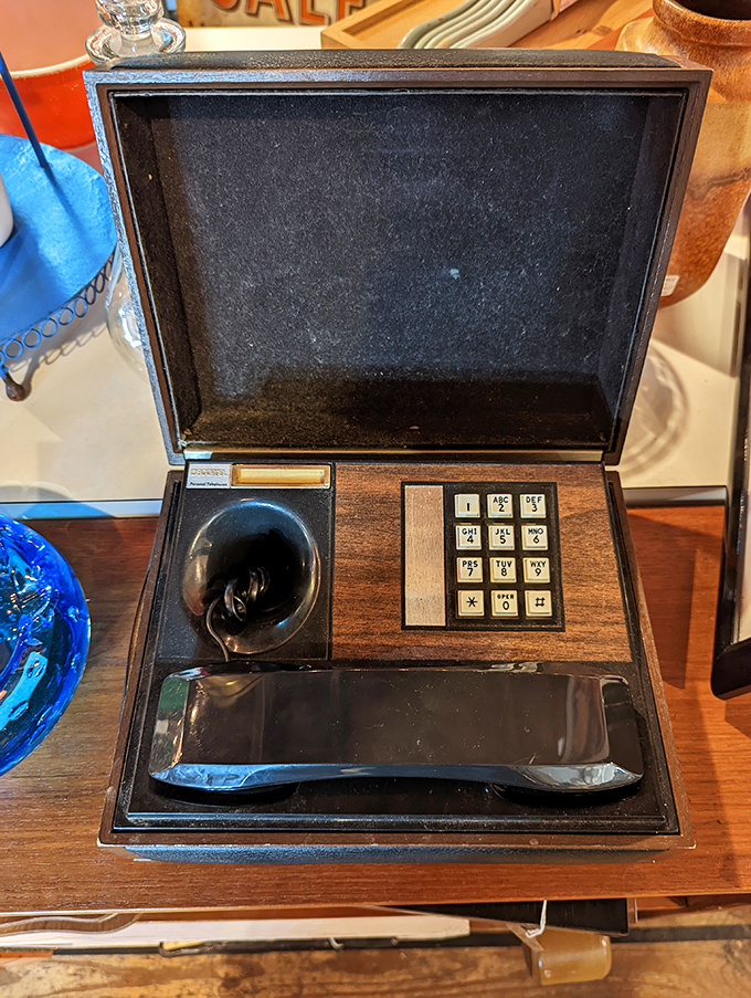This vintage telephone box isn't just an antique&mdash;it's a time machine to when "call waiting" meant standing by the phone.