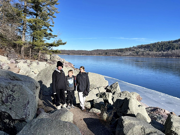 Family adventures create memories that outlast photographs. These explorers found their perfect perch among nature's ancient architecture.