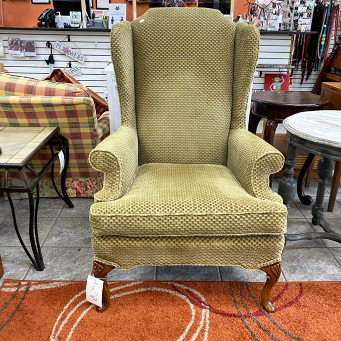 A wingback chair with the dignified presence of someone who's seen things—like your grandfather, but with better upholstery and fewer opinions about politics.