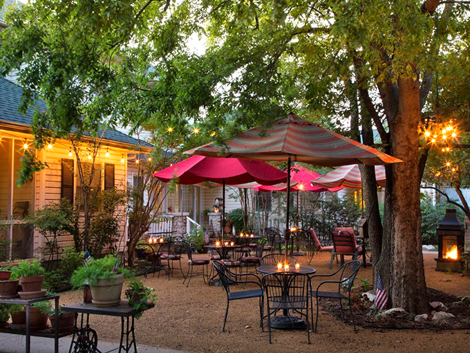 As evening falls, the backyard transforms into an enchanted garden where conversations flow as freely as the Oklahoma breeze.