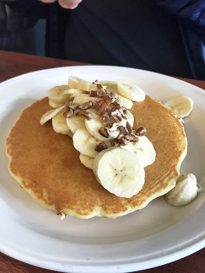 Banana pancakes topped with nuts &ndash; nature's way of saying "You deserve something special today" in breakfast form.
