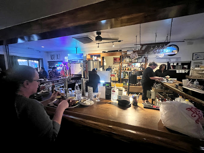 Where magic happens: the bar area buzzes with conversation and clinking glasses as patrons contemplate their carnivorous adventures.