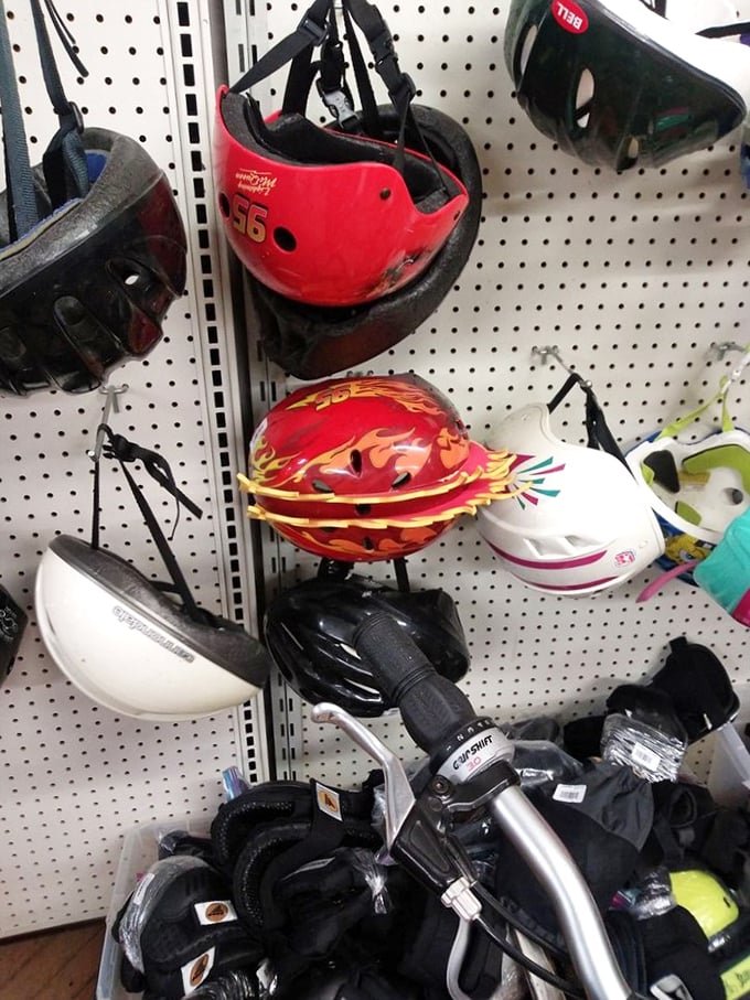 Golfer's gold mine! These clubs nestled in rustic barrels are waiting for their next fairway adventure. Tiger Woods started somewhere, right?