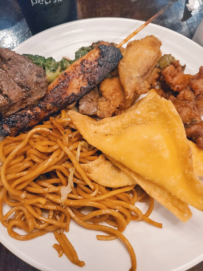 The plate that tells the story of buffet expertise&mdash;a little of everything, perfectly balanced. This isn't amateur hour; this is strategic buffet architecture.